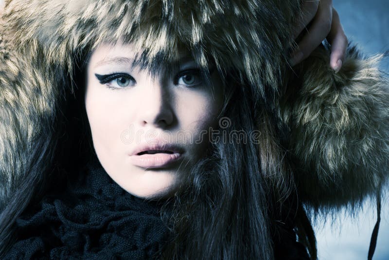 Lady in fur cap stock image. Image of glamour, leather - 17650801