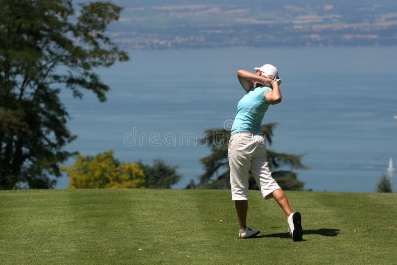 Lady Golf Swing at Leman Lake Stock Photo - Image of lake, fairway: 2901534