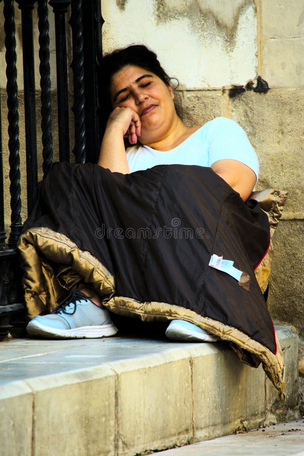 Lady Half Sleeping in the Street. Seville Editorial Stock Image - Image ...