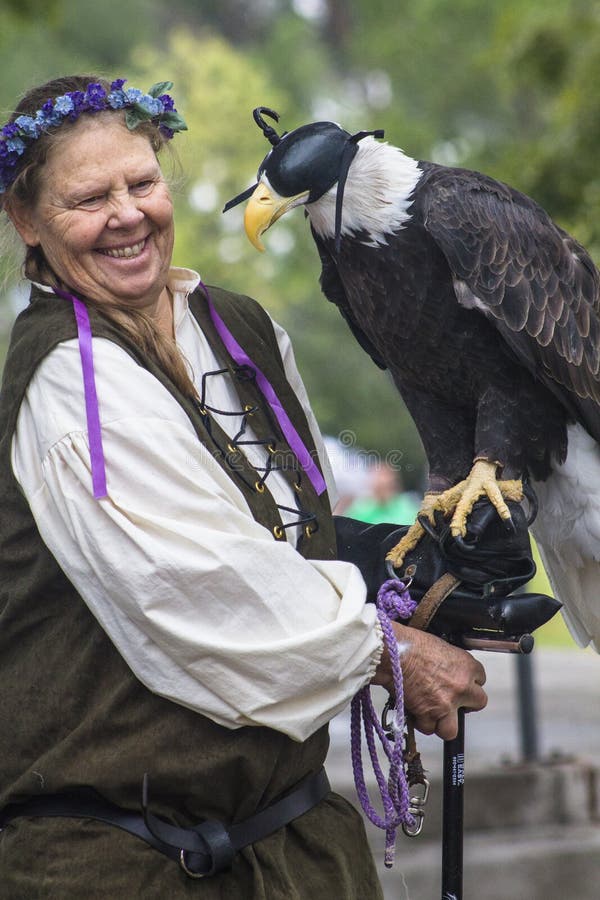 Lady Holding the American Bald Eagle Editorial Image - Image of ...