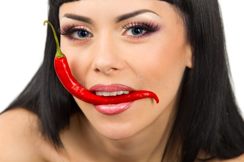 Lady with Red Hot Chilli Pepper Stock Photo - Image of eating, holding ...