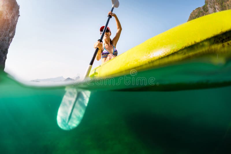 Lady with the kayak stock photo. Image of island, paddling - 64515176