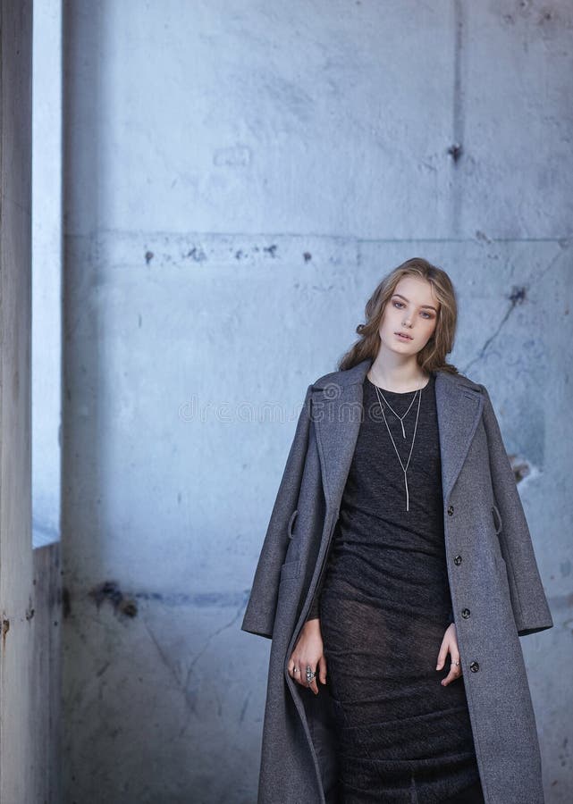 A Lady in a Long Grey Jacket. Stock Photo - Image of beautiful ...