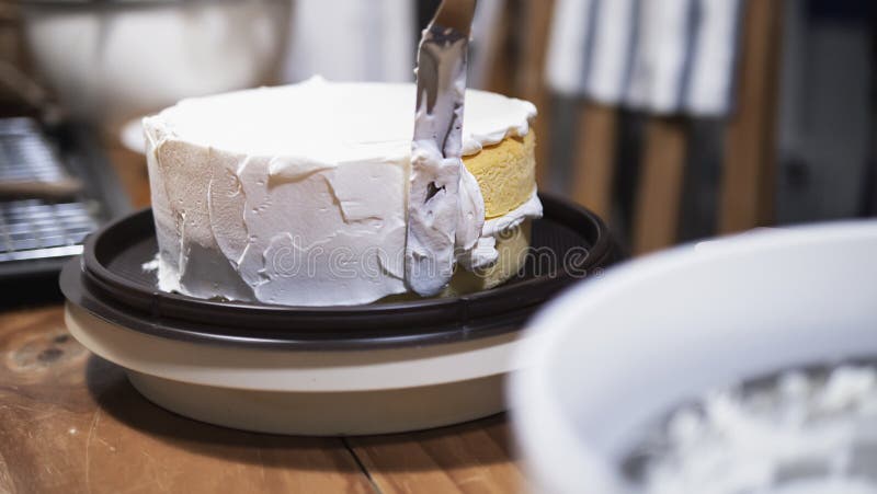 Lady making cream cake stock photo. Image of closeup - 232079522