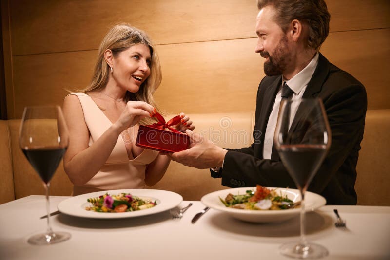 Lady Opens a Red Box with Gift from Her Partner Stock Image - Image of ...