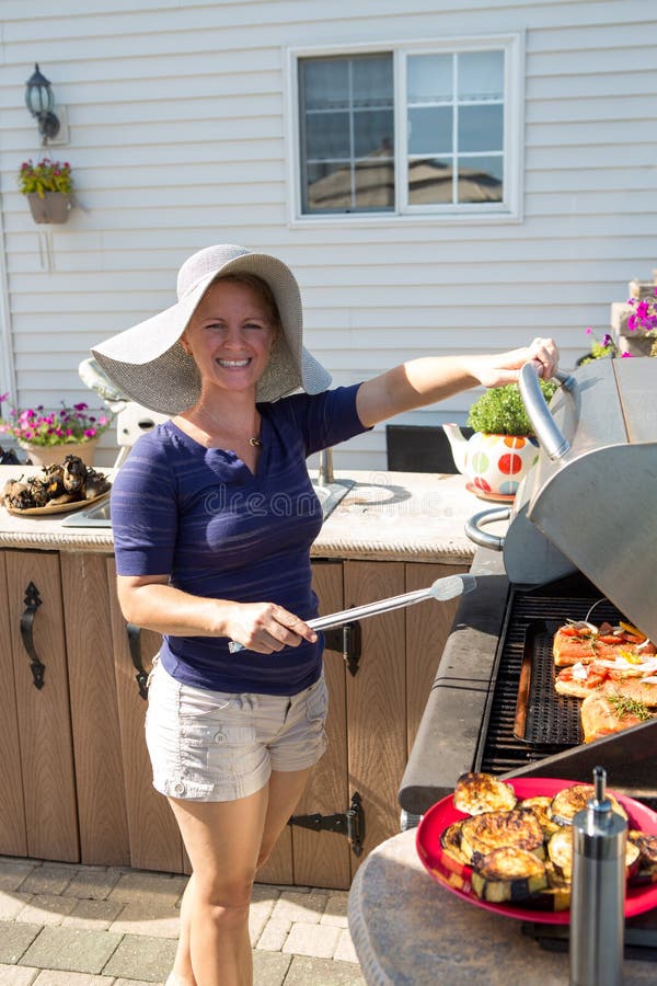 Group of Friends Having Outdoor Barbeque at Home Stock Image - Image of ...