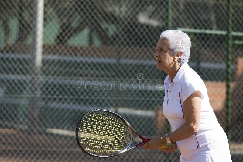 Lady playing tennis stock photo. Image of player, senior - 2404268