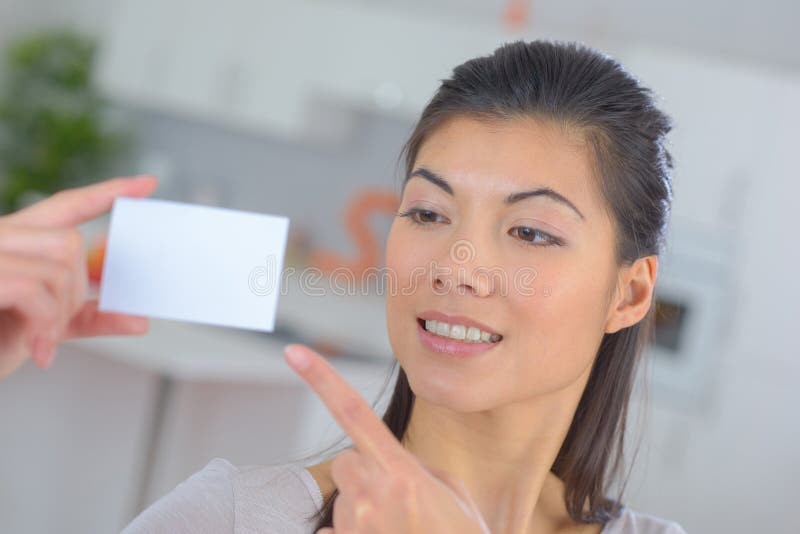 Lady Pointing To Blank Business Card Stock Photo - Image of space ...