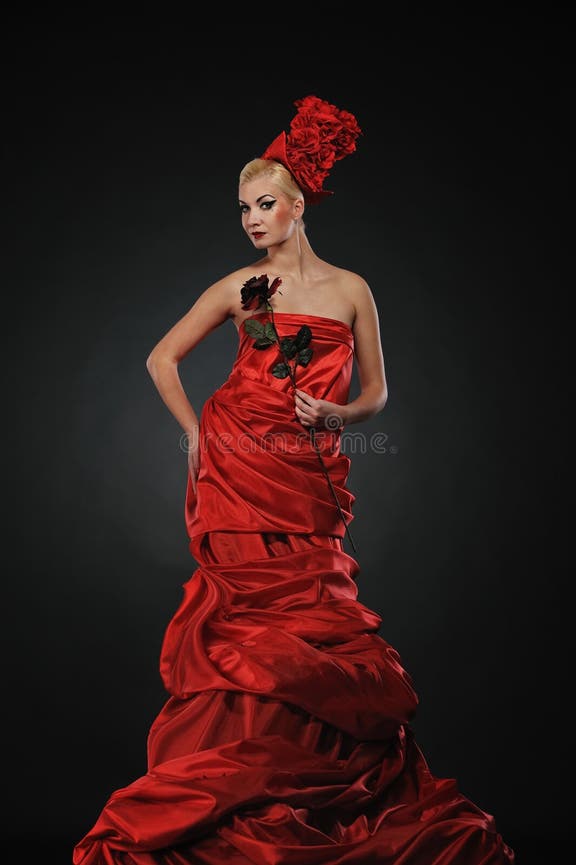 Lady with a red rose stock image. Image of elegant, flower - 13729591