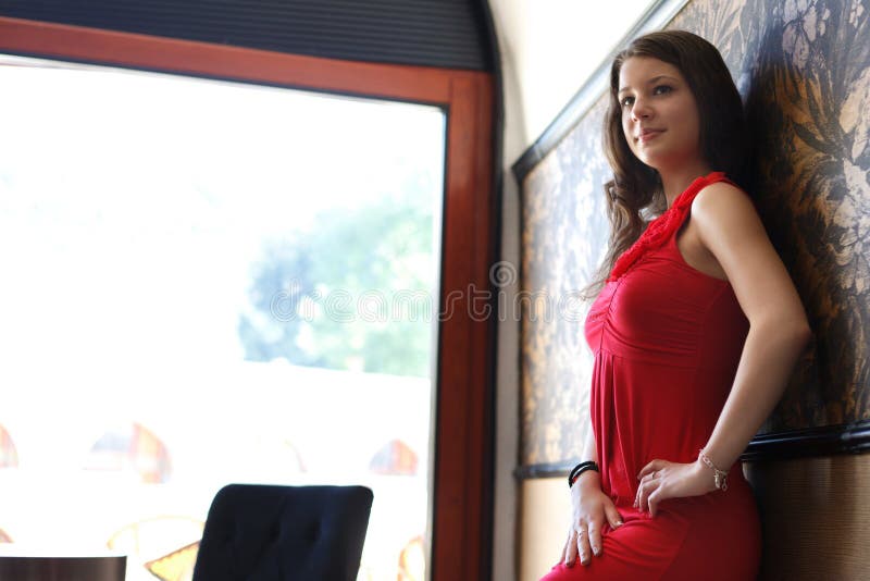Lady in red waiting stock image. Image of looking, healthy - 25636775
