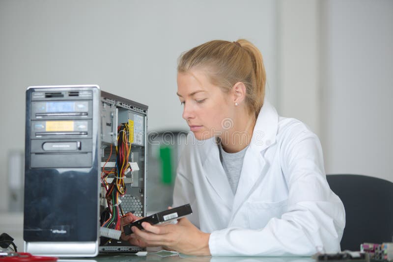 Lady repairing computer stock photo. Image of work, industry - 186442162