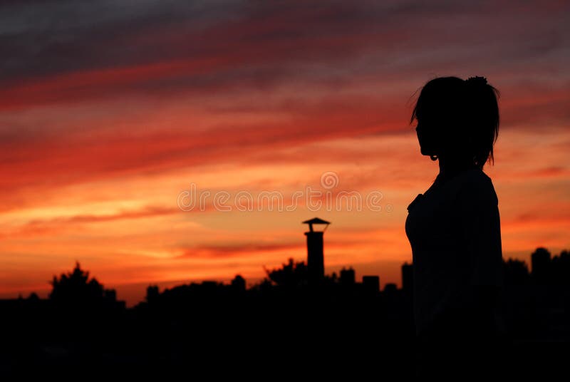 Lady on rooftop stock photo. Image of lady, dusk, sunset - 3207952