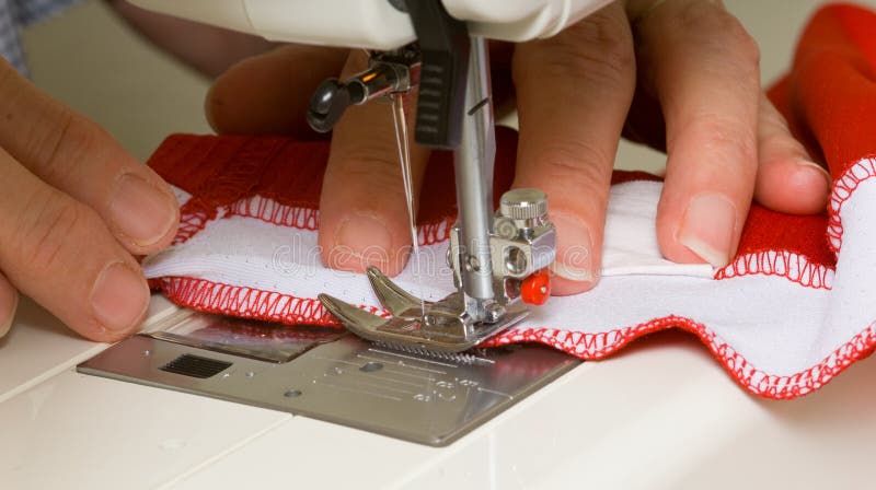 Lady at a Sewing Machine stock photo. Image of hands, sewing - 3259350