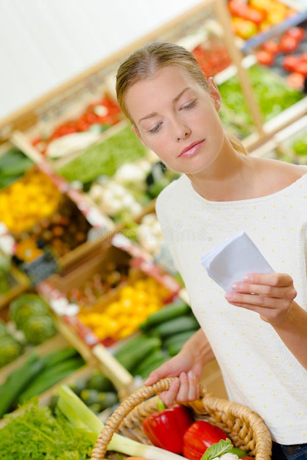 Lady Shopping Checking List Stock Photo - Image of carrots, blonde ...