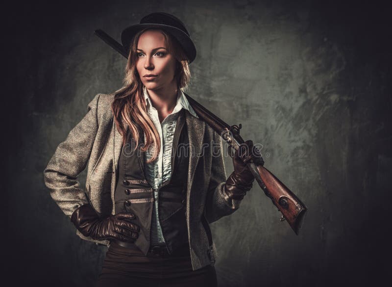 Lady With Shotgun And Hat From Wild West On Dark Background. Stock ...