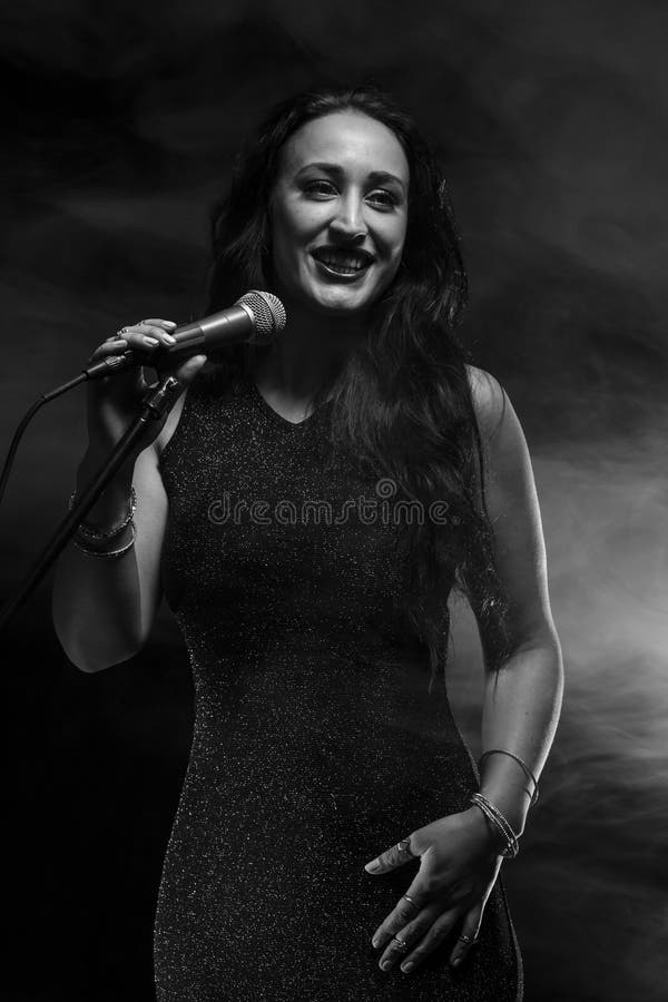 Lady Singer stock image. Image of finger, pretty, face - 54593115