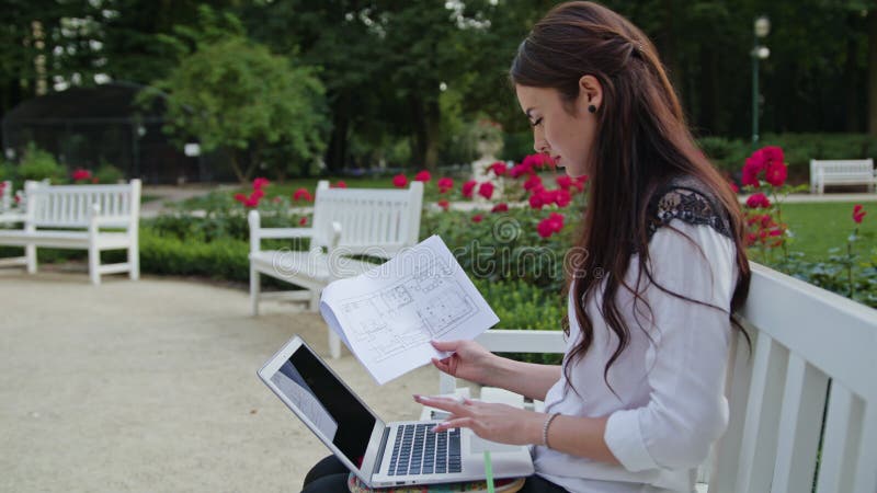 Lady Sitting in the Park, Using Laptop. Data Entry Stock Photo - Image ...