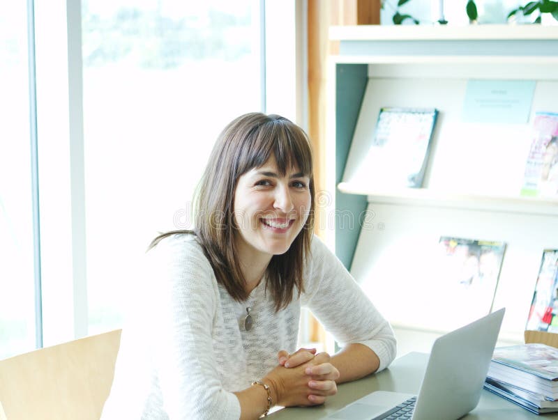 Lady Sitting at Table with Computer Stock Photo - Image of working ...