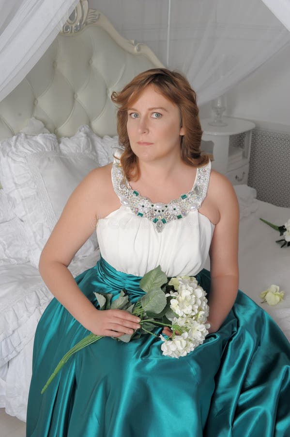 Lady in a smart dress stock photo. Image of beauty, furniture - 40910648