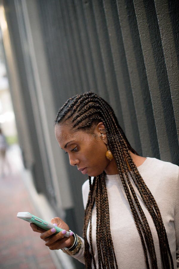 Lady texting on cell phone stock image. Image of wireless - 104807353