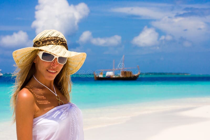 Lady on a tropical beach stock image. Image of coastline - 17643041