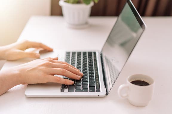 Lady Typing on a Laptop at the Table Stock Photo - Image of beautiful ...