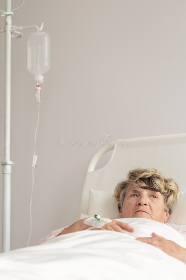 Lady under the drip stock photo. Image of retirement - 56941842