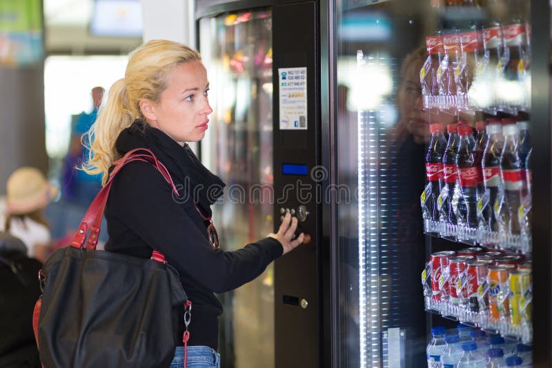 Lady Using a Modern Vending Machine Editorial Photo - Image of drink ... Lady Using a Modern Vending Machine Editorial Photo - Image of drink ...