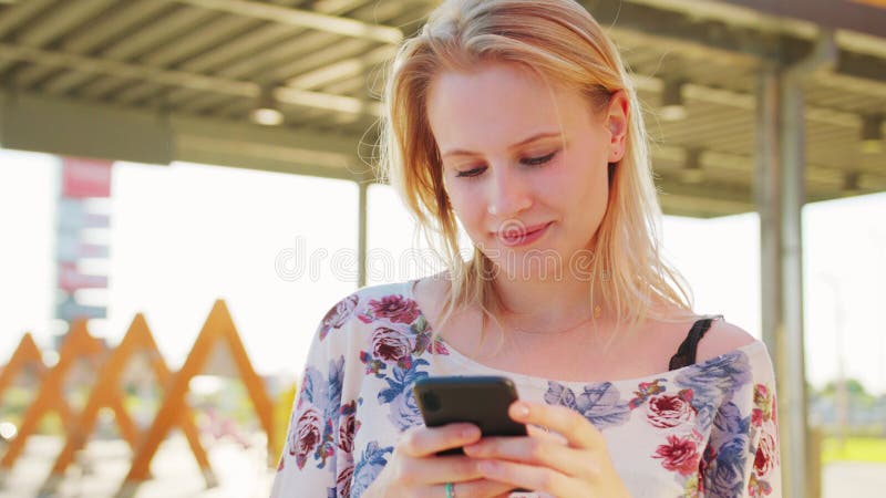 Lady Using a Phone Outdoors Stock Photo - Image of display, mouth ...
