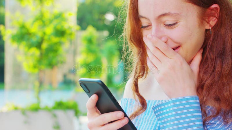 Lady Using a Phone Outdoors Stock Image - Image of city, beauty: 153558815