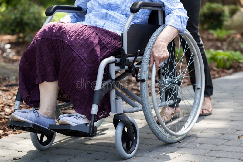 Lady on a Wheelchair in Park Stock Photo - Image of insurance, aged ...