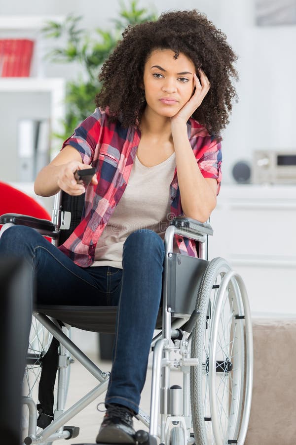 Lady in Wheelchair Using Remote Control Stock Image - Image of choice ...