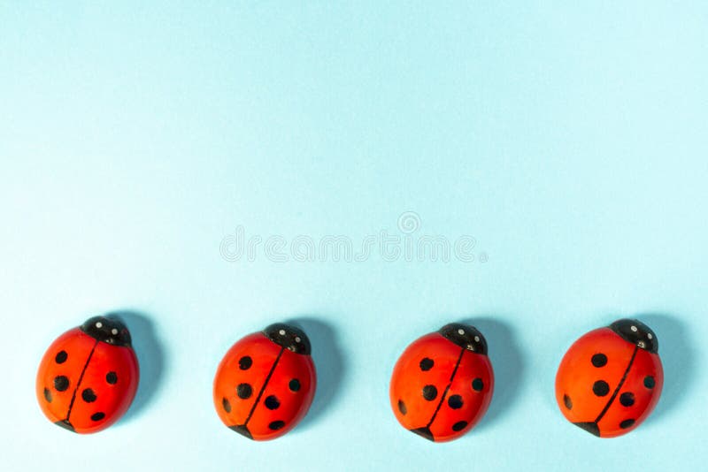 Ladybugs on a Colored Surface Stock Photo - Image of color, decoration ...