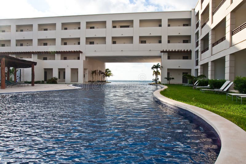 Lagoon Pool Under Resort Hotel Stock Image - Image of water, vacation ...