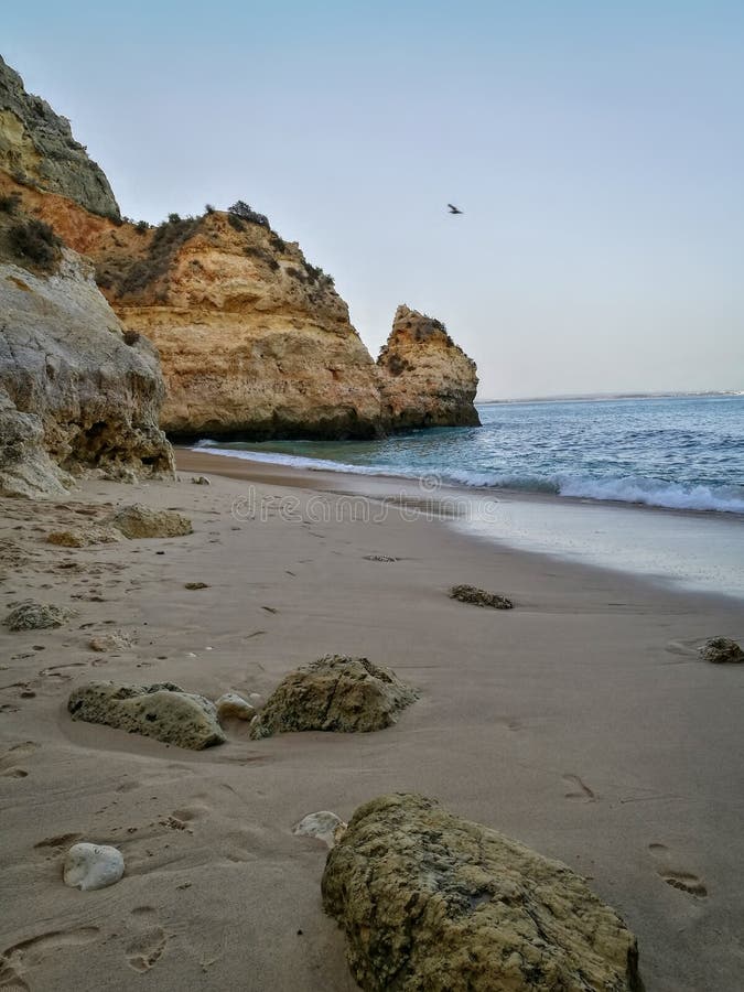 Lagos beach scene Portugal stock image. Image of enjoy - 97164287