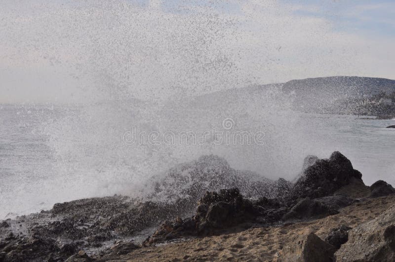 Laguna Beach Wave Crashing on Rocks Stock Photo - Image of rocks ...