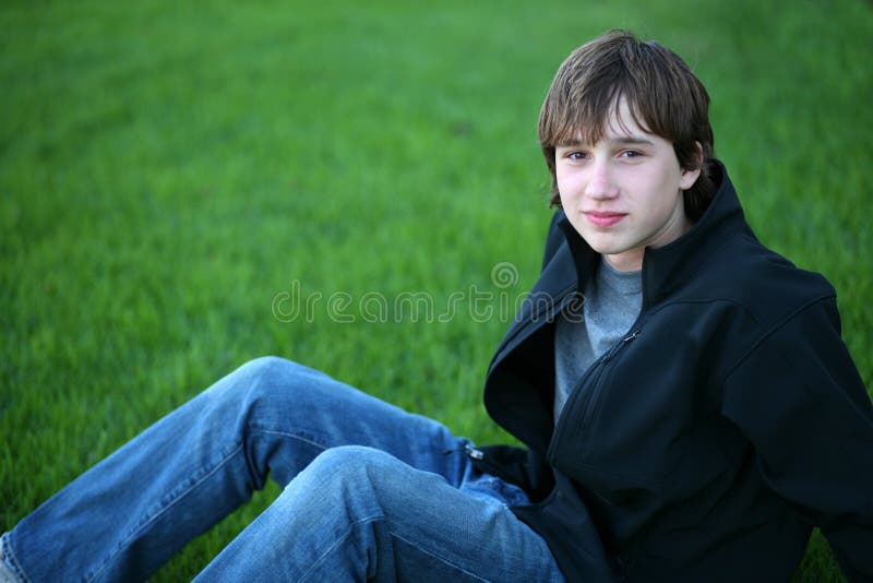 Laid Back Luke stock photo. Image of cute, grass, hair - 3515164