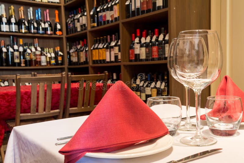 Laid table in a restaurant stock image. Image of decoration - 67194507