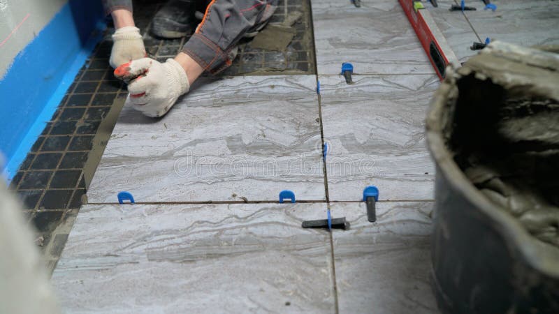 Laying Ceramic Tiles. the Laid Tiles in the Bathroom. Stock Image ...
