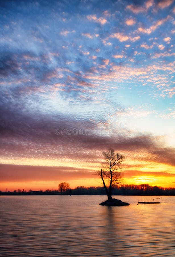 Lake with Alone Tree at Dramatic Sunset Stock Image - Image of ... Lake with Alone Tree at Dramatic Sunset Stock Image - Image of ...