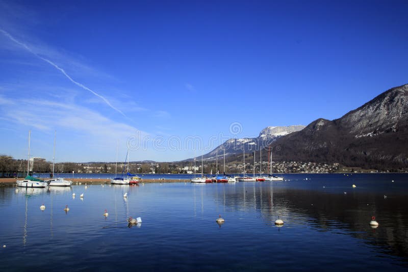 Lake Annecy in winter stock image. Image of sailing, boats - 51778901