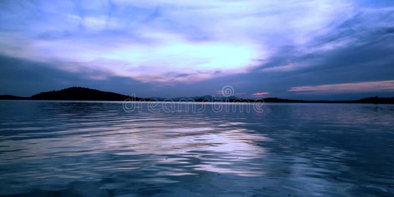 Lake stock photo. Image of waters, sets, ripples, lake - 142837232