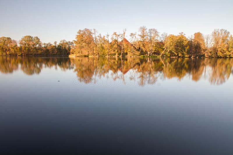Lake in the autumn stock image. Image of peaceful, water - 130391375