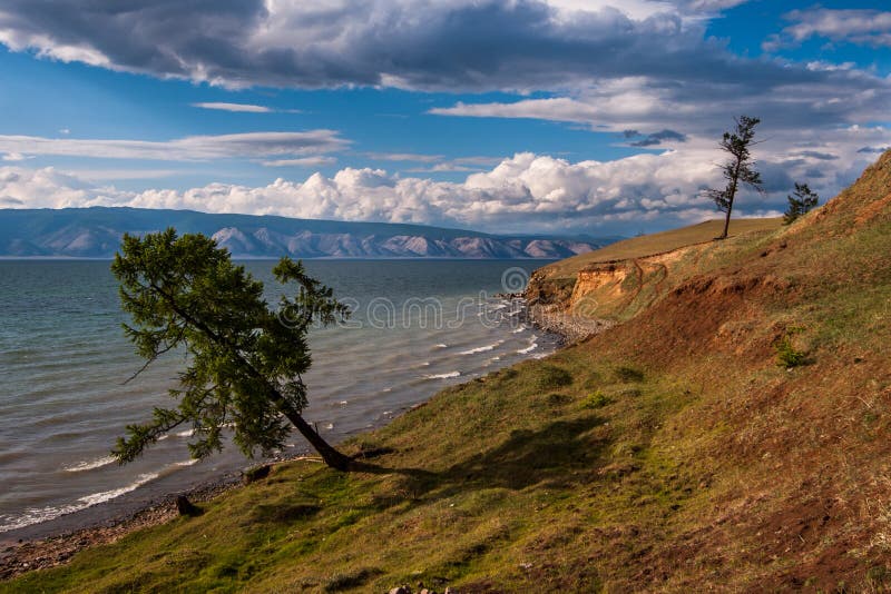 Lake Baikal with Mountains in the Background and Beautiful Clouds and ...
