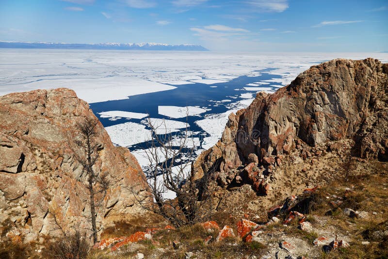 Lake Baikal in Spring, Ice Drift. Rocks of Olkhon Island Stock Image ...