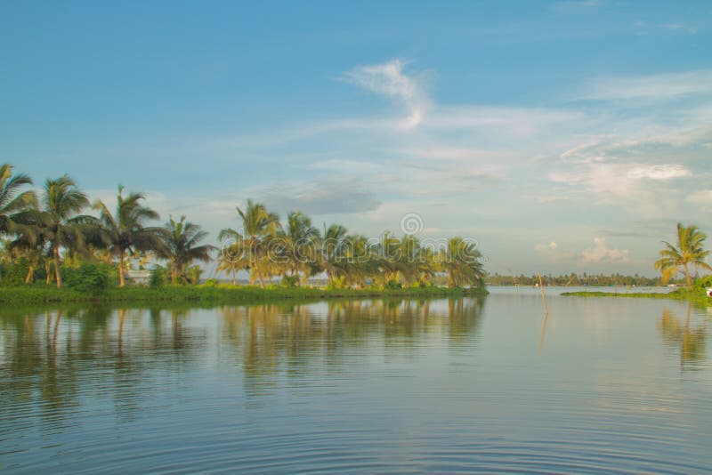 Lake Banks with a Partial View of the Fishing Boat and Coconut Trees ...