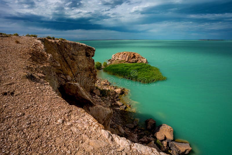 Lake with beautiful rocks stock photo. Image of landmark - 127181132