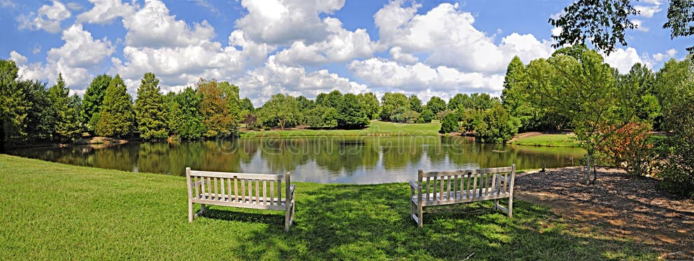 Lake and Bench Panorama stock photo. Image of pond, grass - 21305262