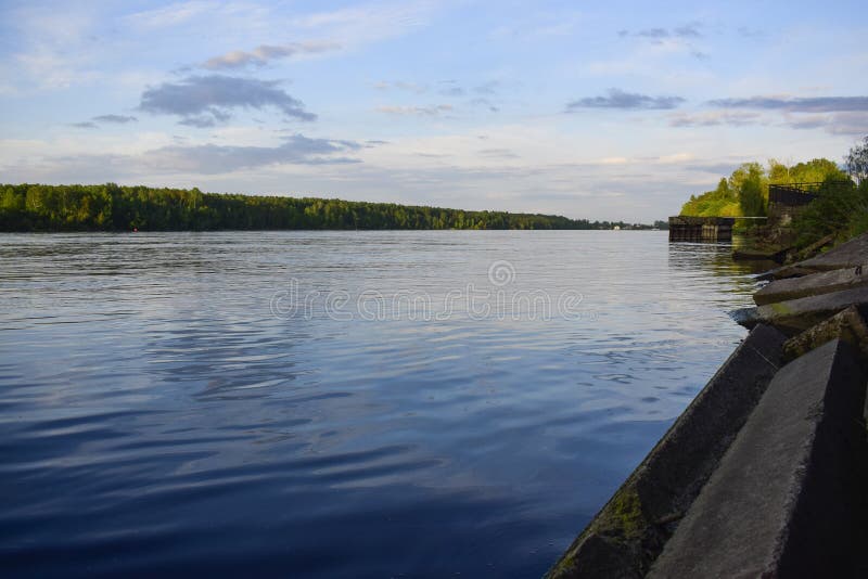 Lake, Blue Water, Visible Coastline and Forest in the Distance Stock ...
