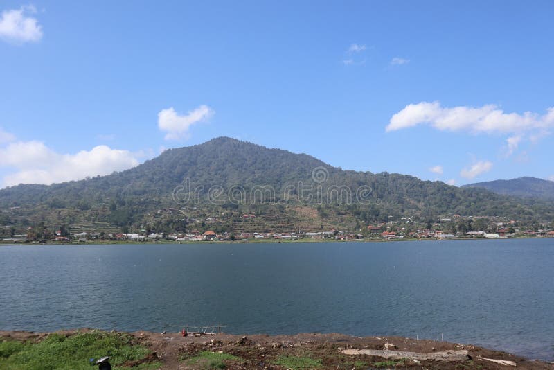 Lake Buyan stock image. Image of lake, mountain, cloud - 127182757